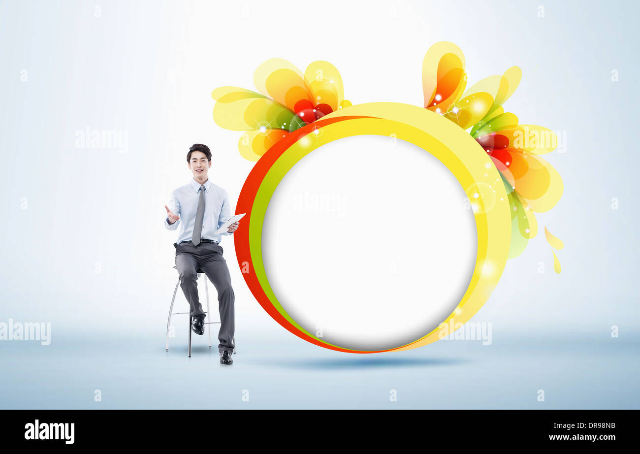a business man next to an illustrated circle Stock Photo - Alamy