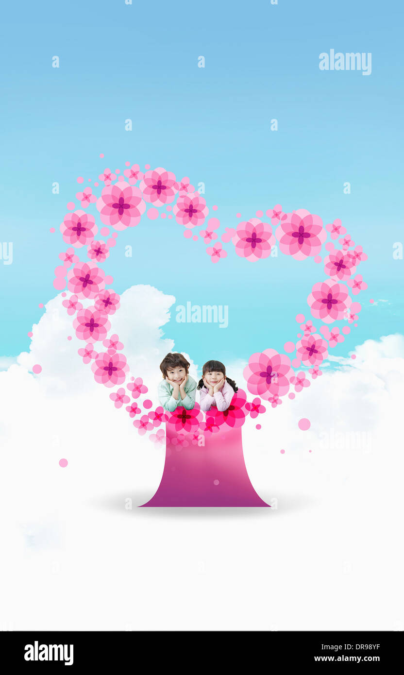 kids lying in an illustrated tree Stock Photo - Alamy