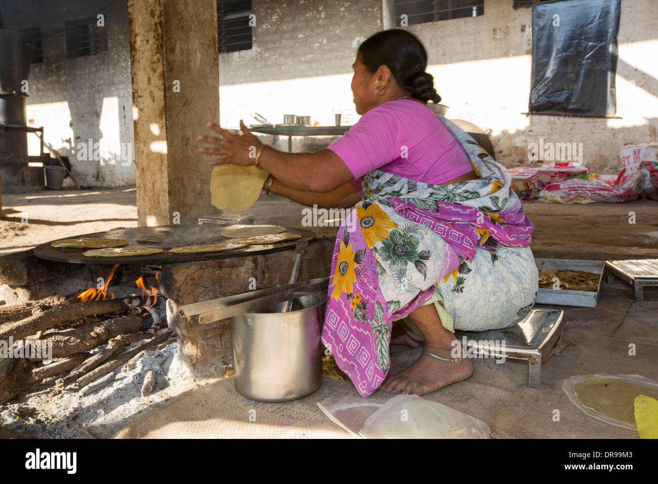 Cooking using wood at the Muni Seva Ashram in Goraj, near Vadodara ...