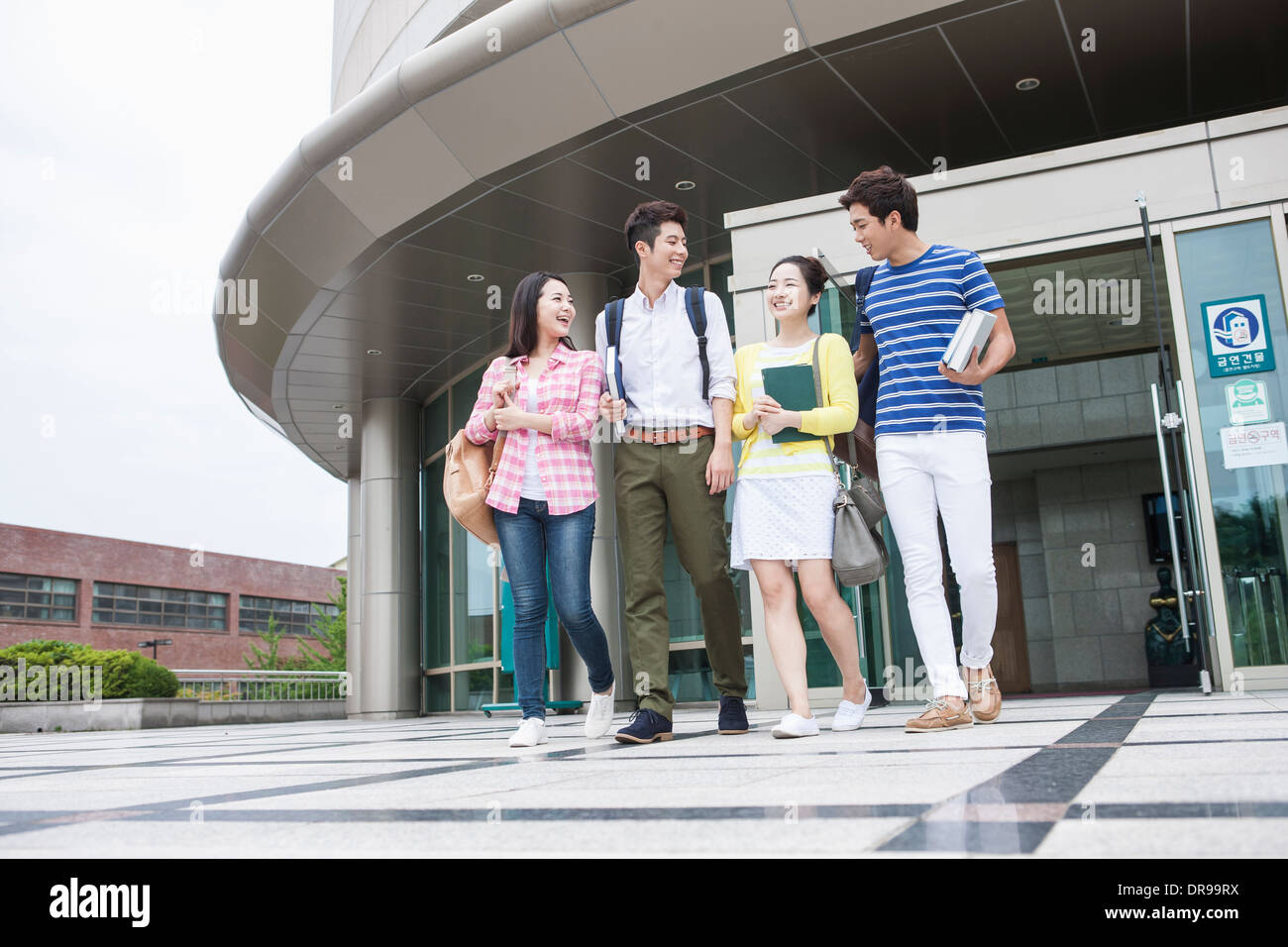 university students leaving the building Stock Photo - Alamy