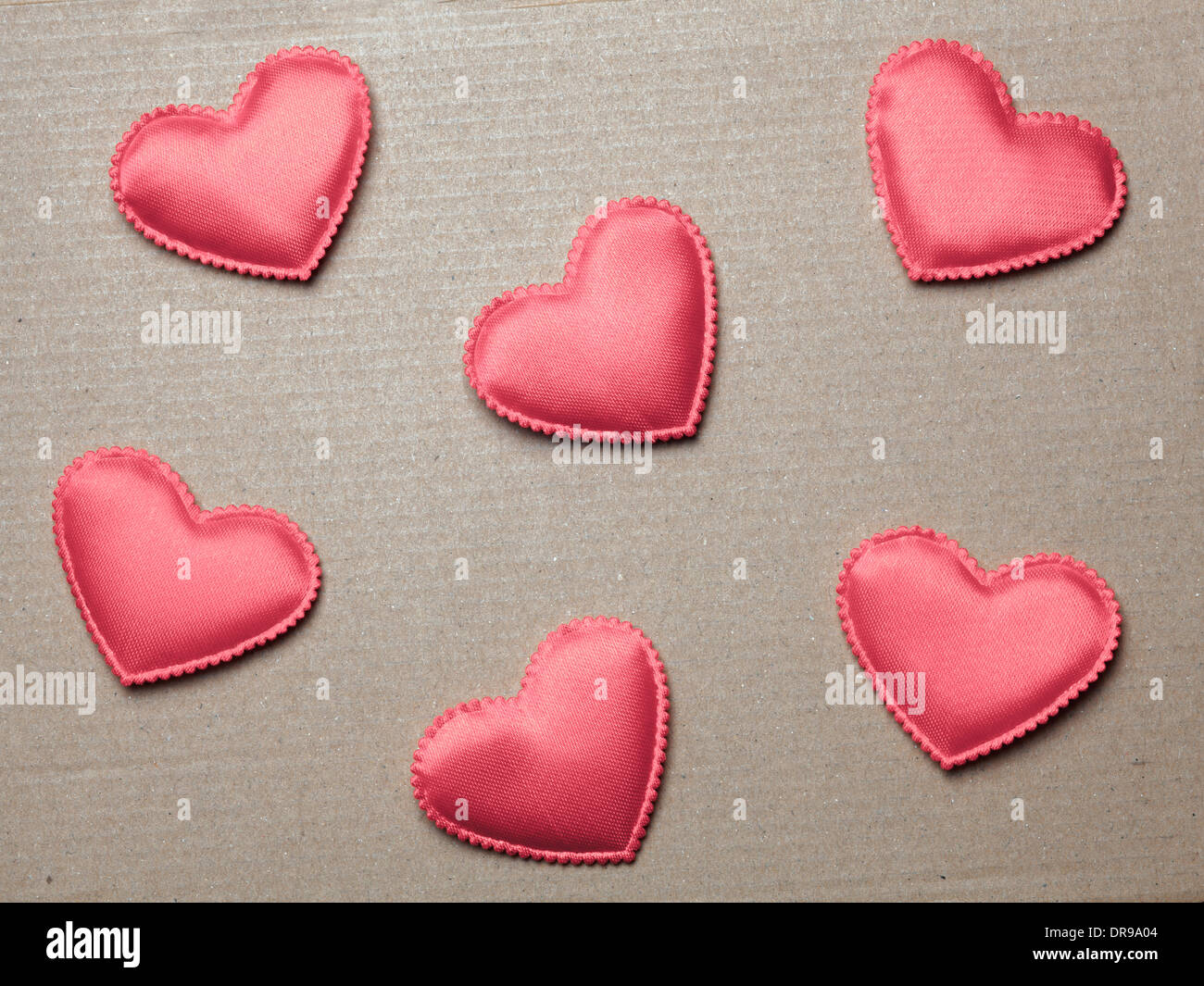 red hearts on vintage paper background with copyspace Stock Photo - Alamy