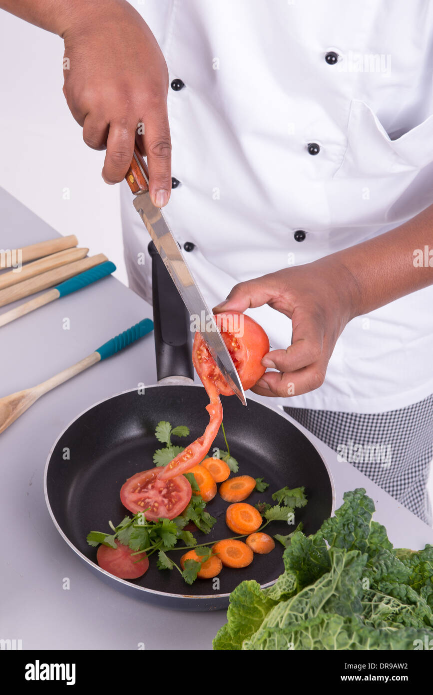 Mature black man cooking kitchen hi-res stock photography and images ...