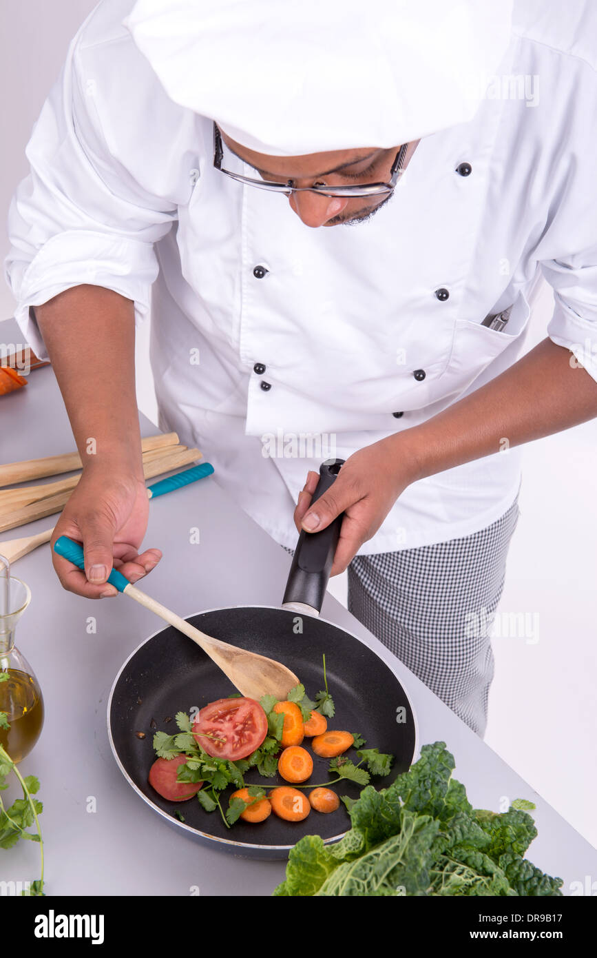 Mature black man cooking kitchen hi-res stock photography and images ...
