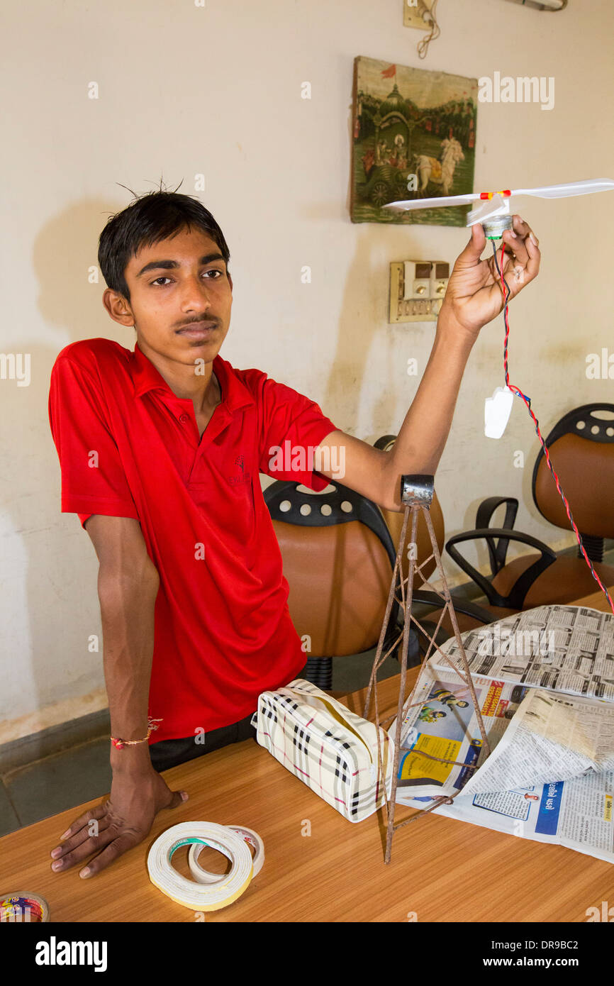 a student making a fan powered by solar electricity at The Muni Seva ...