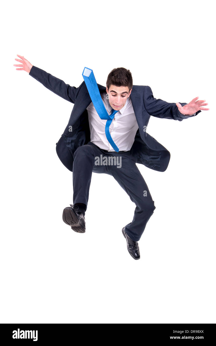 Businessman jumping high isolated in white Stock Photo - Alamy
