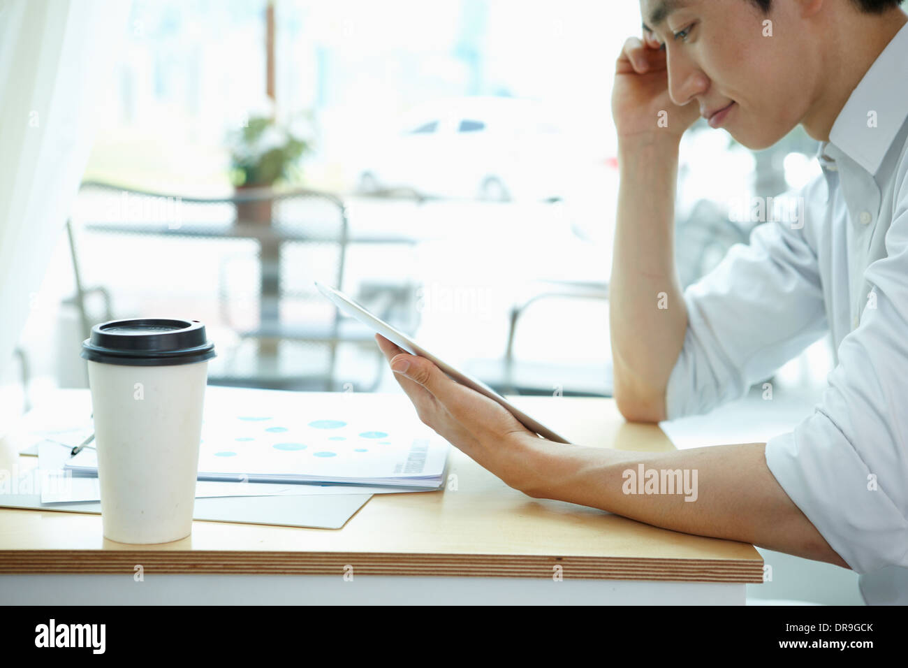 Working in a coffee shop hi-res stock photography and images - Alamy
