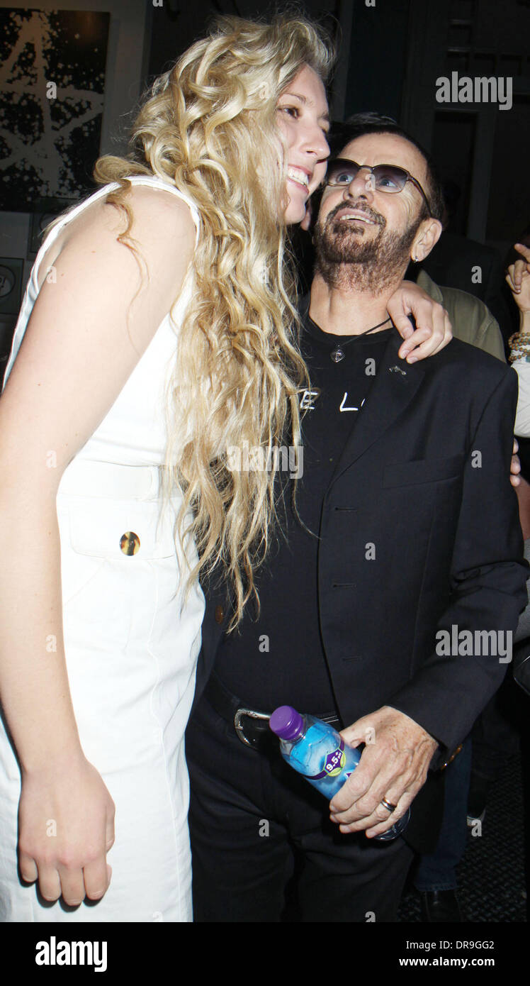 Ringo Starr poses with a fan as he attends his POP Art Collection ...