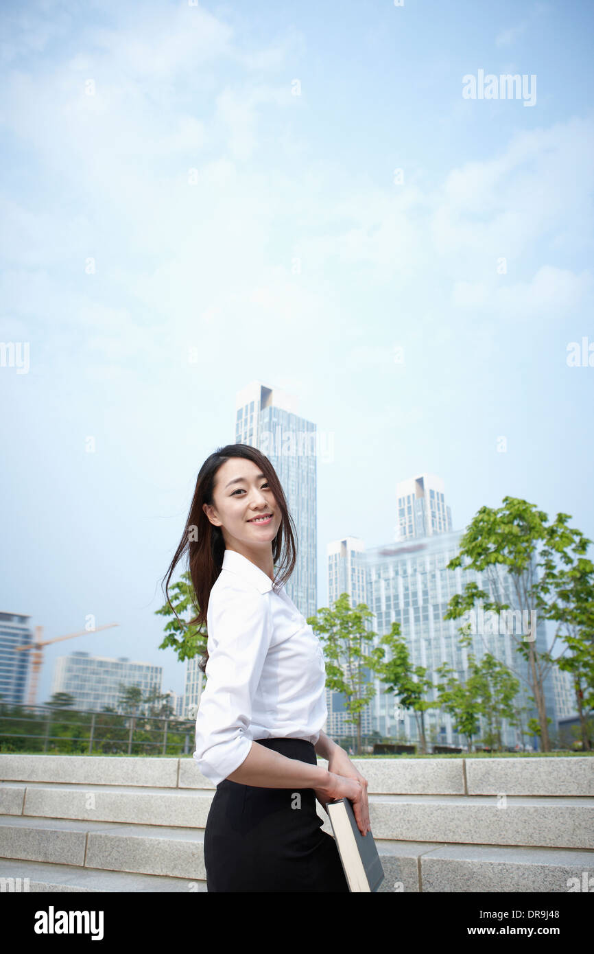 Woman walking up stairs side view hi-res stock photography and images ...