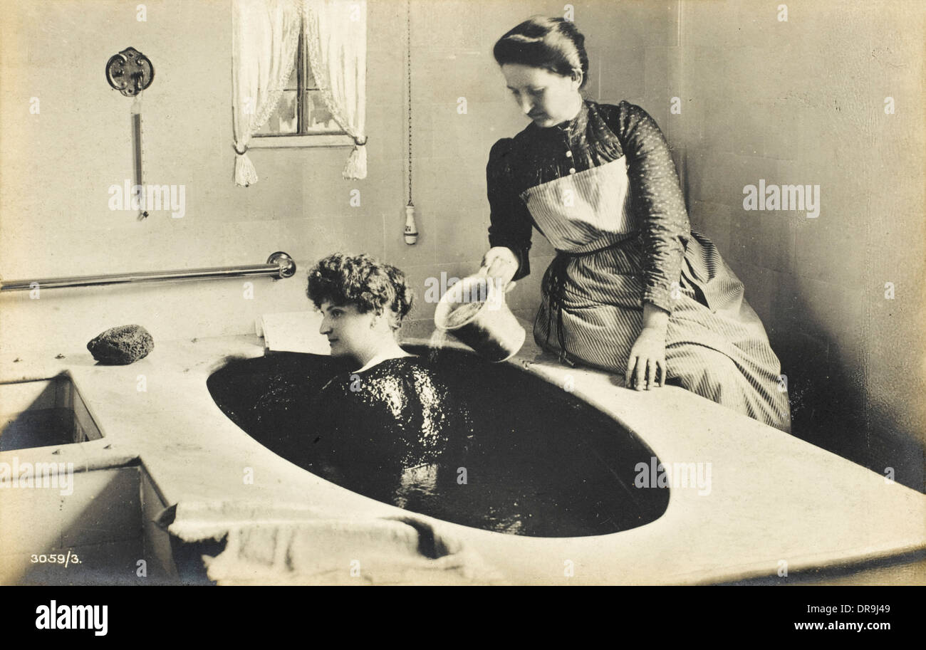 Lady in a mud bath Stock Photo - Alamy
