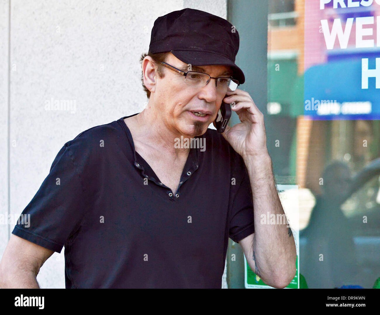 Billy Bob Thornton talks on his mobile phone while out and about on ...