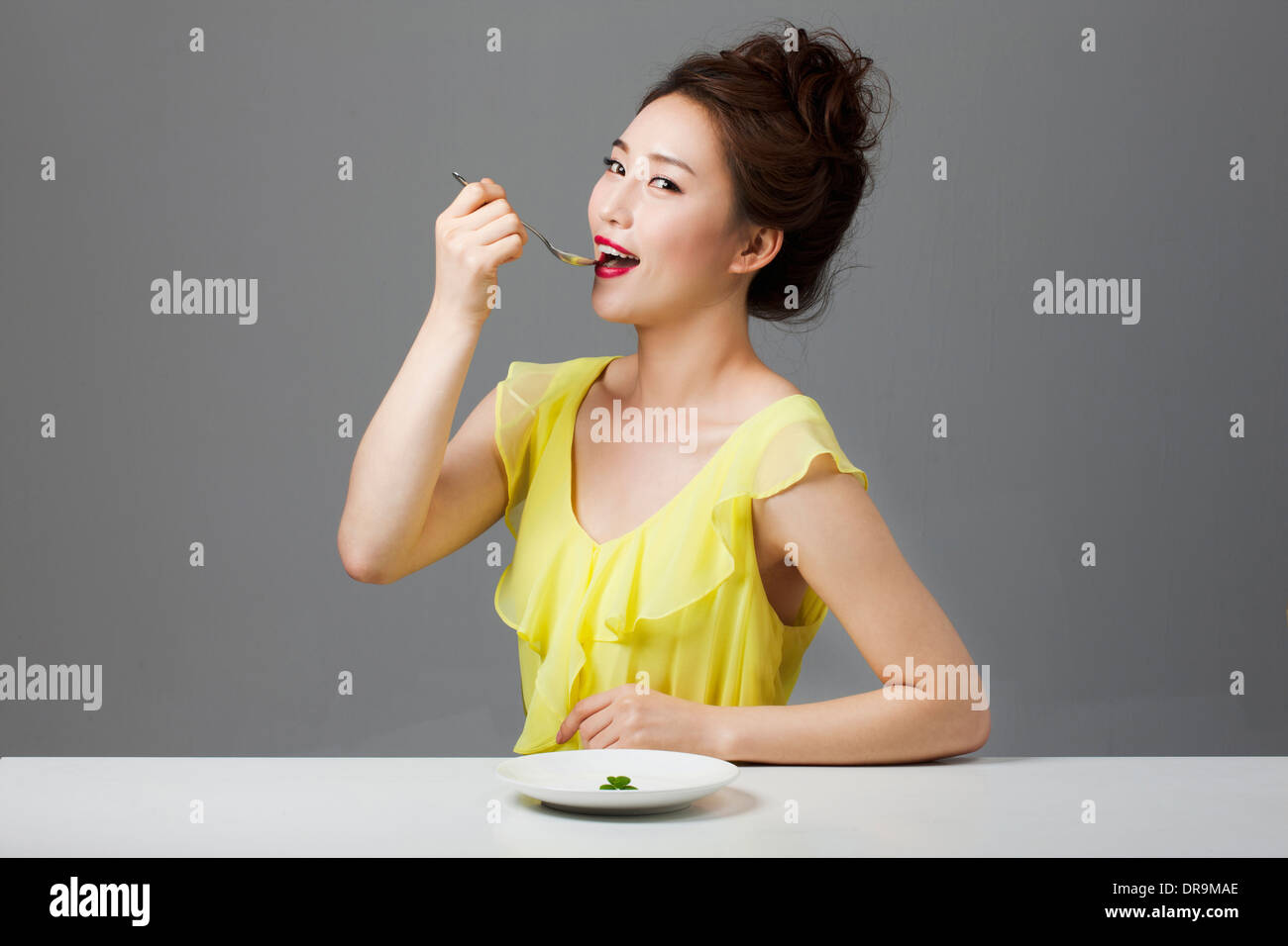 Woman smiley face plate hi-res stock photography and images - Alamy