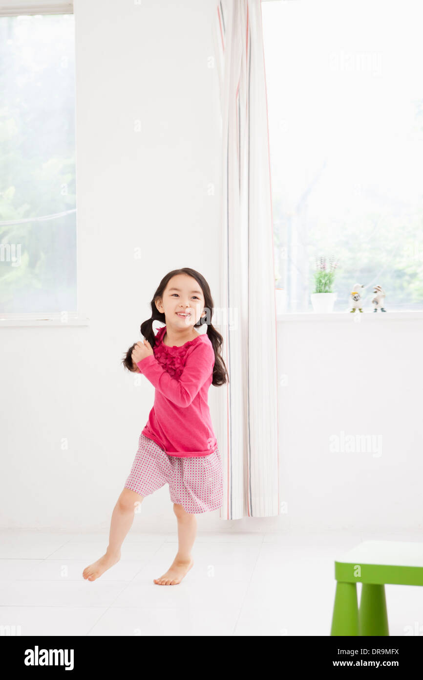 a girl running inside Stock Photo - Alamy