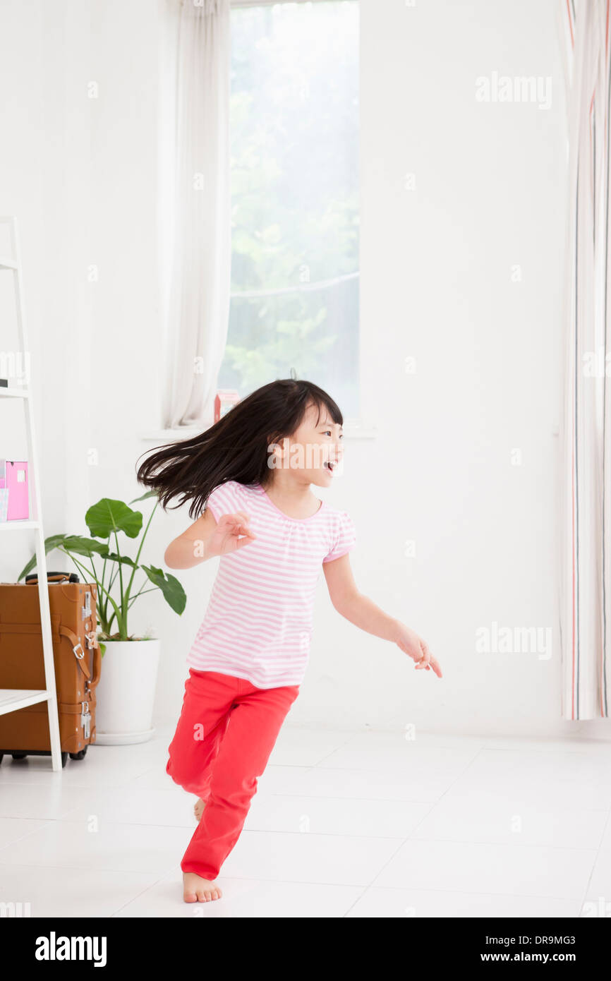 a girl running inside Stock Photo - Alamy