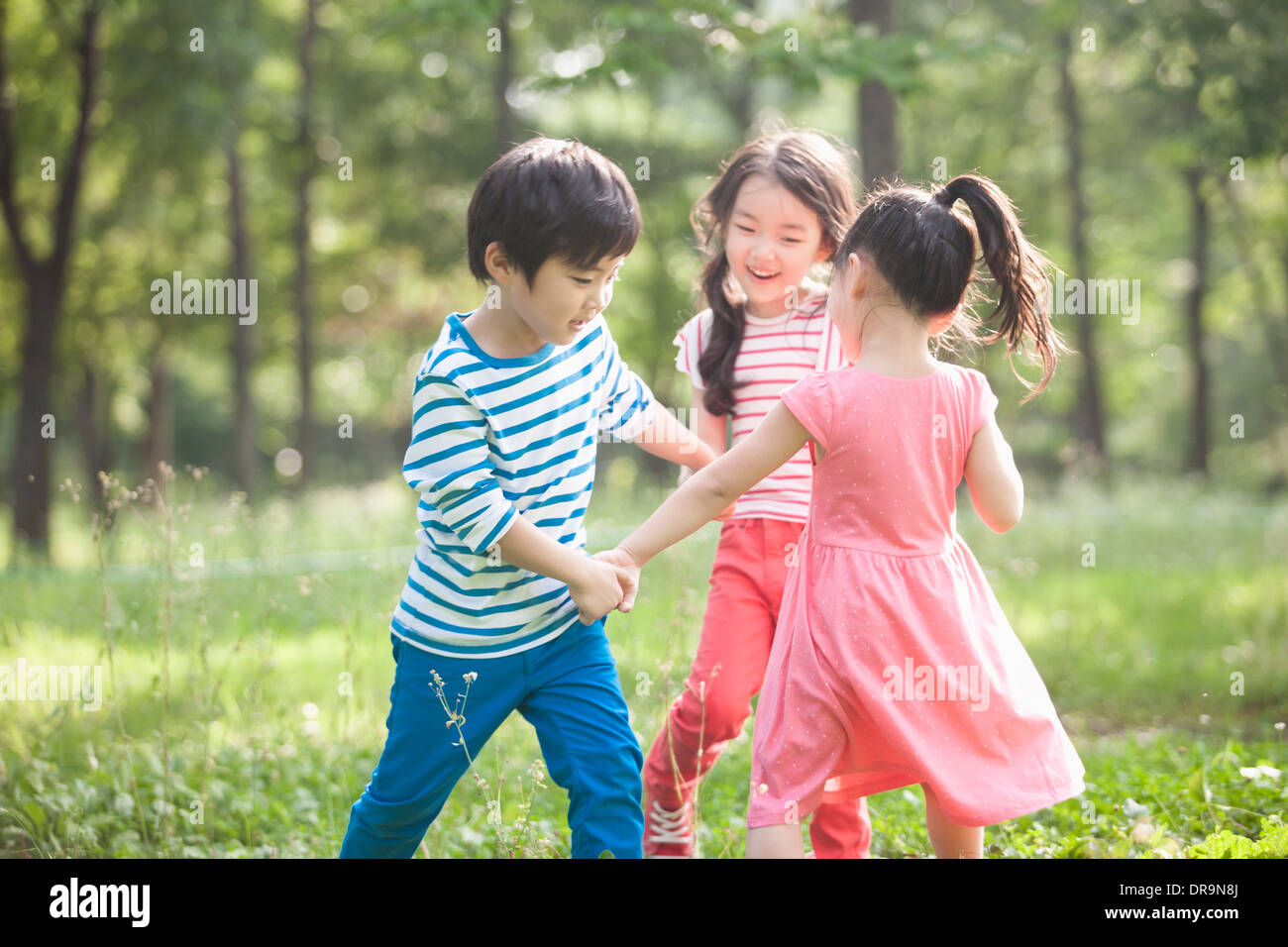 kids playing in the nature Stock Photo - Alamy