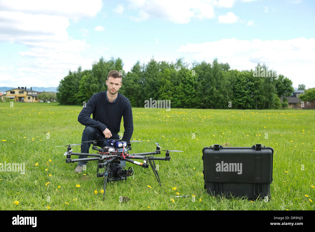 Engineer With UAV Helicopter in Park Stock Photo - Alamy