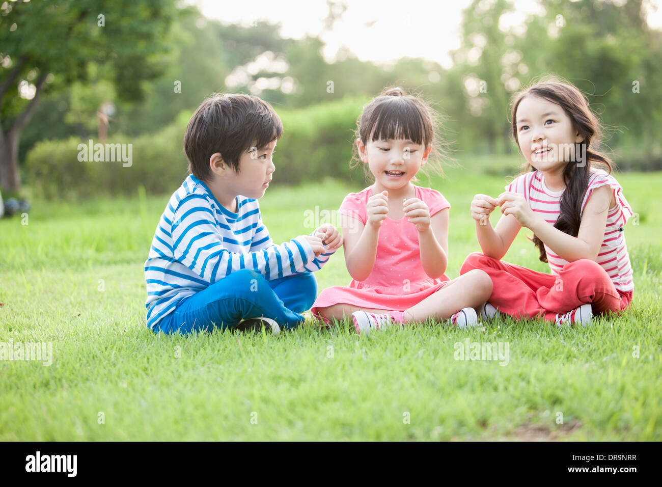 Children smile and grass hi-res stock photography and images - Alamy