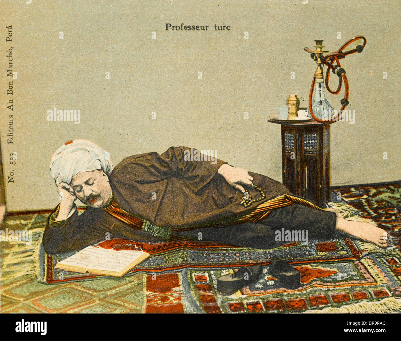 Turkish Professor reading a text Stock Photo - Alamy