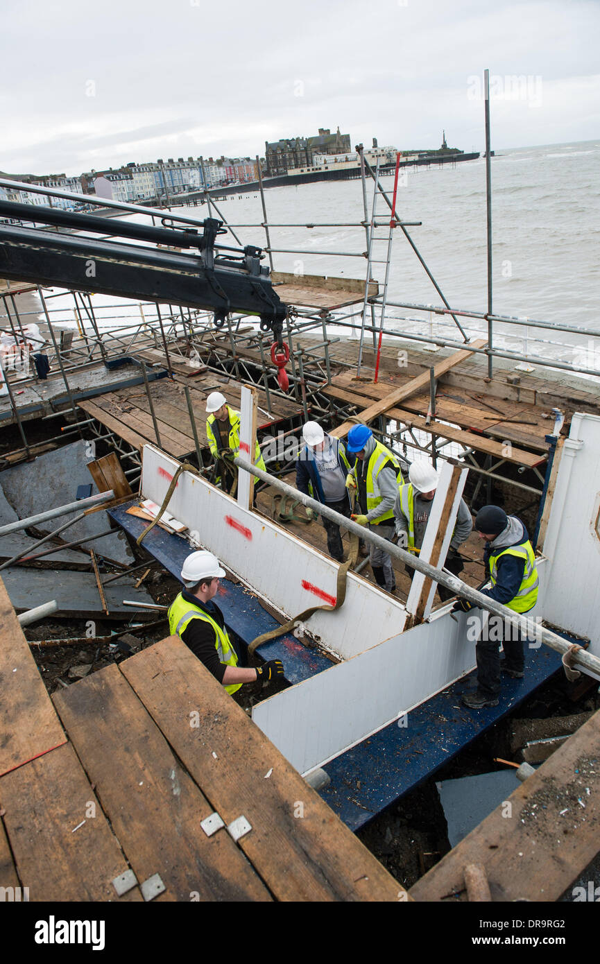 Aberystwyth Wales UK, January 22 2014 Workmen remove the last sections ...
