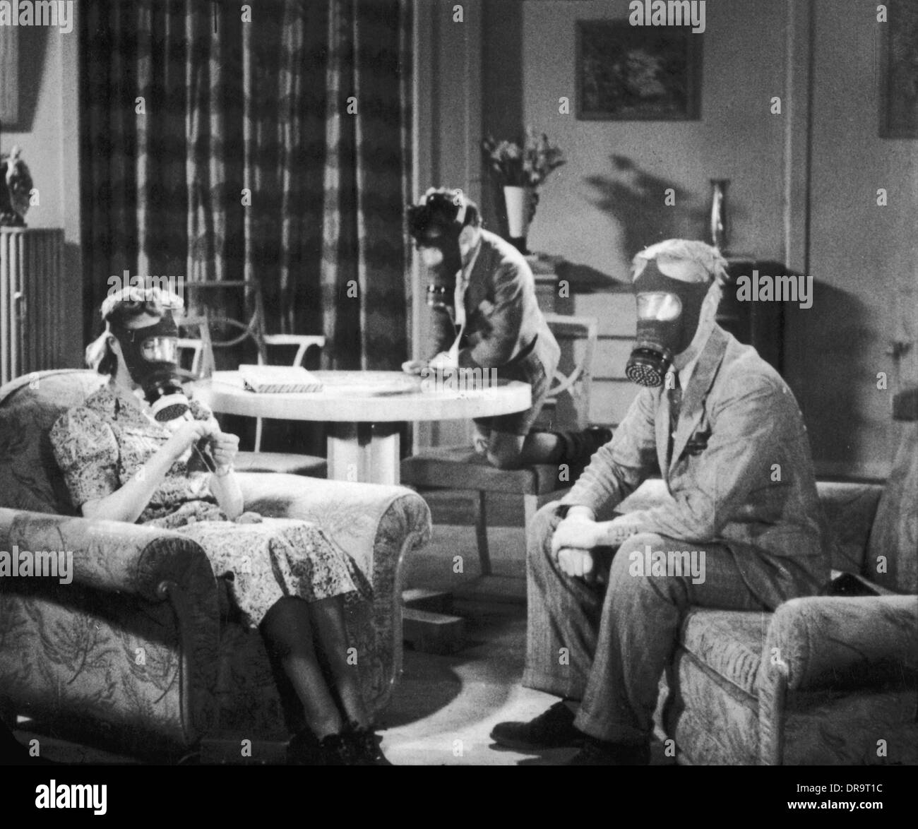 Family wearing gas masks Stock Photo - Alamy