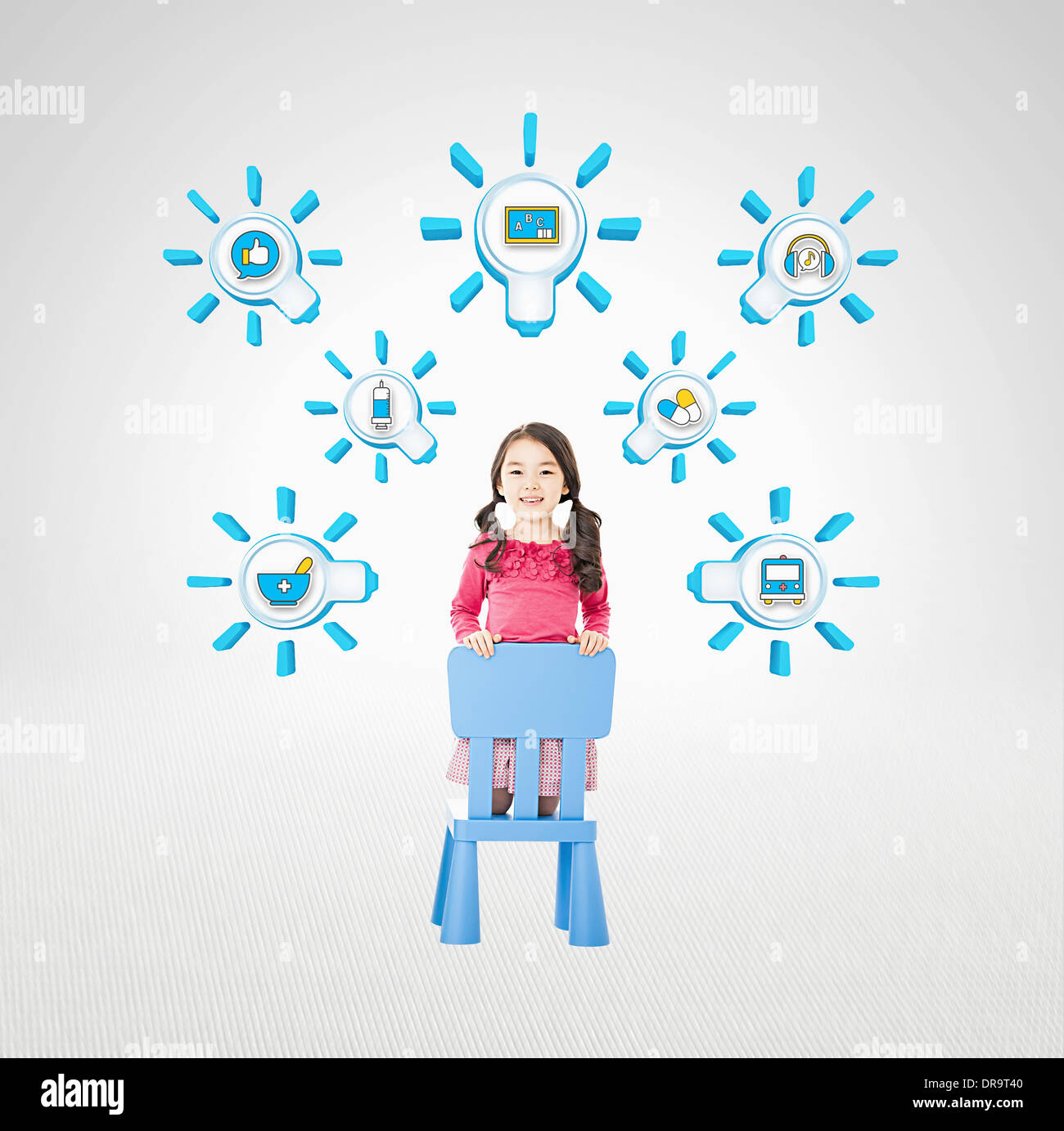 a kid surrounding by light bulbs with icons Stock Photo - Alamy