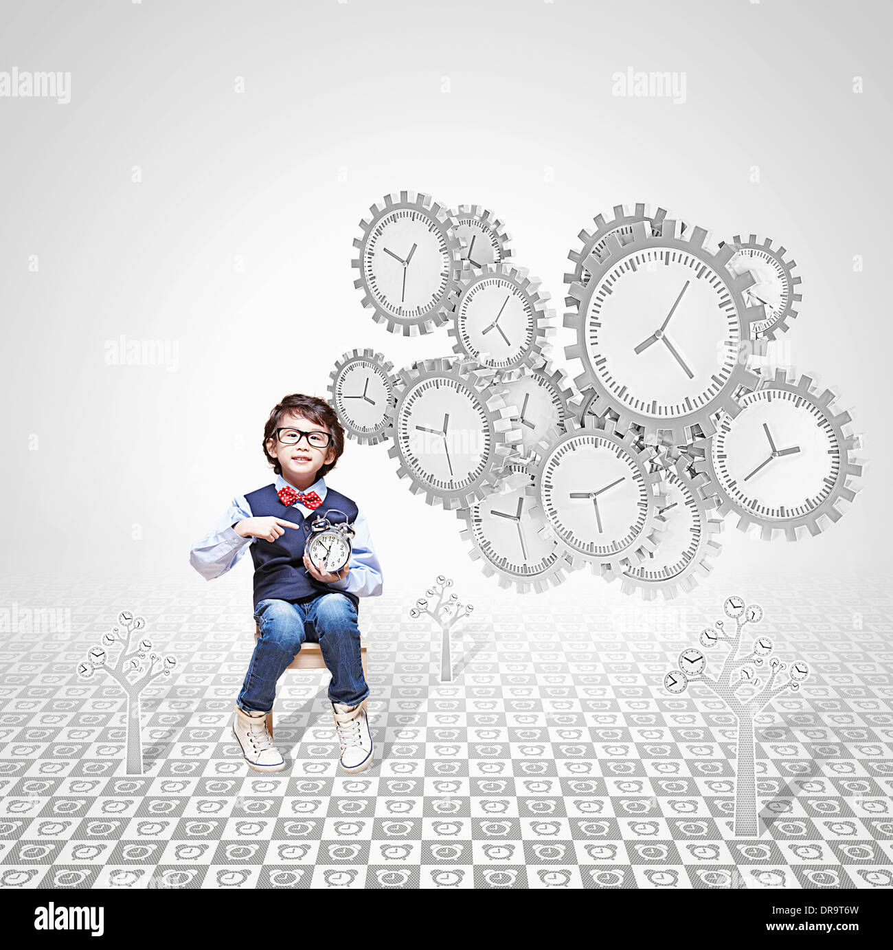 a kid sitting with a clock next to gear clocks Stock Photo - Alamy