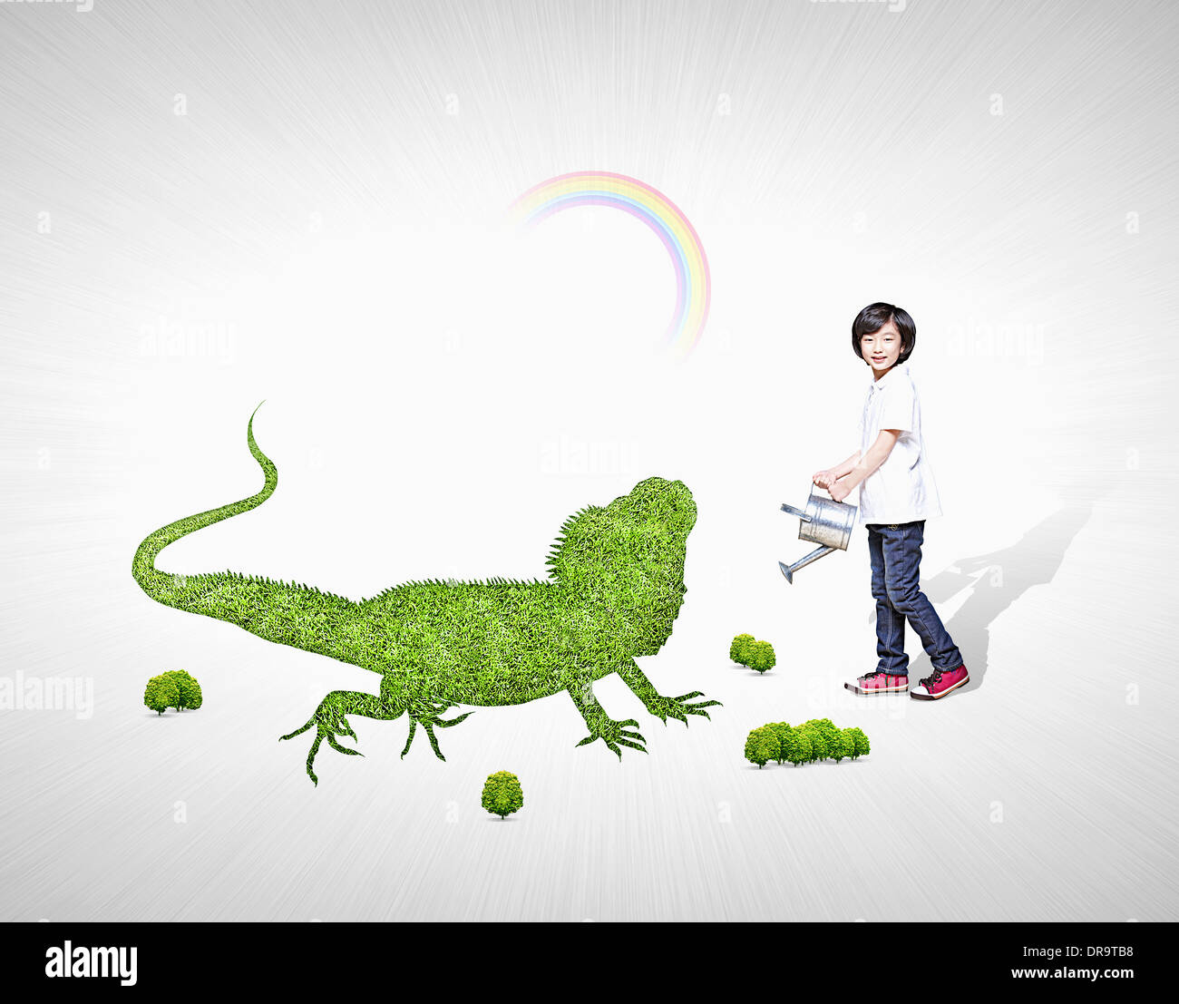 a kid with illustrated lizard Stock Photo - Alamy