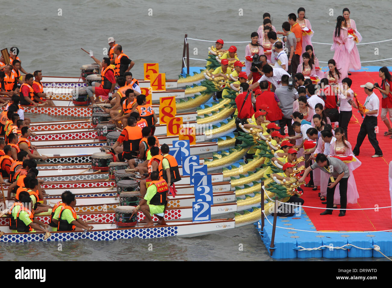 Dragon Boat Festival Rowers compete in a dragon boat race in the ...