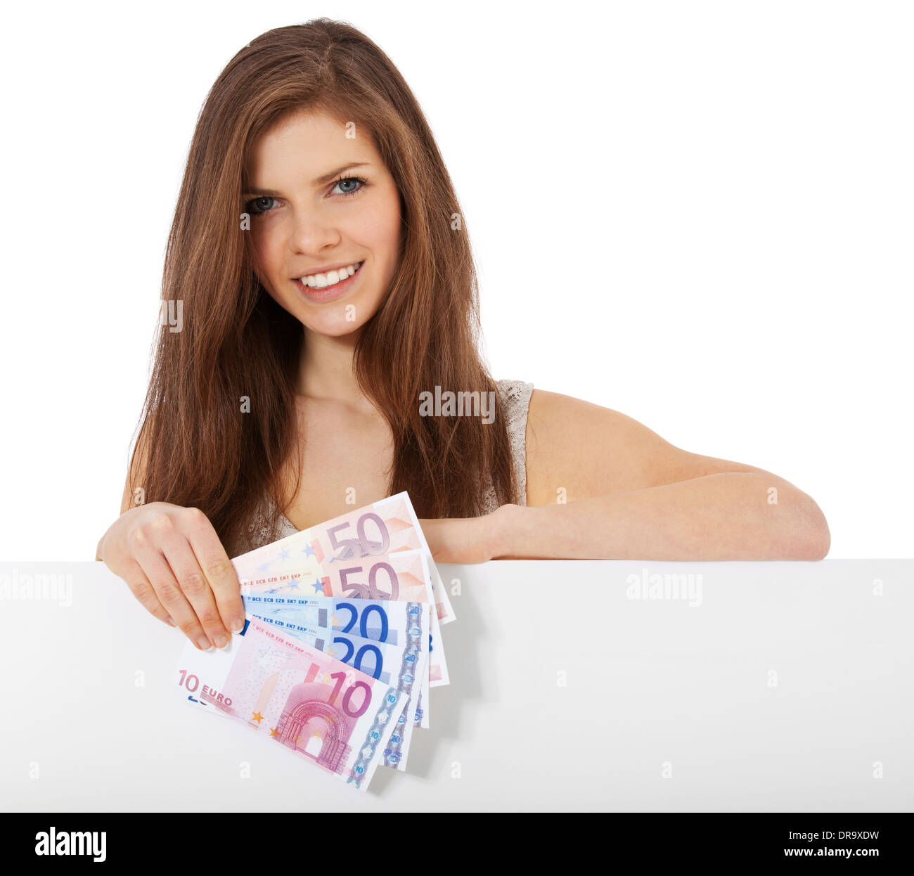 Attractive teenage girl holding euro note. All on white background ...