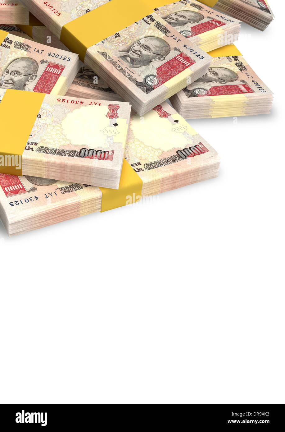 A pile of randomly scattered wads of indian rupee banknotes on an ...