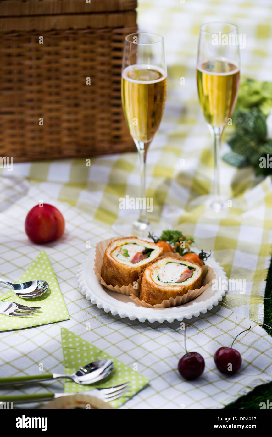 a picnic set spread out on a sheet Stock Photo - Alamy