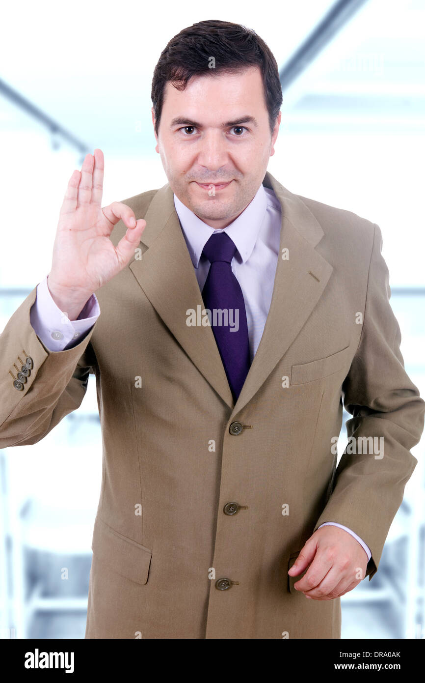 Business man showing OK sign Stock Photo - Alamy