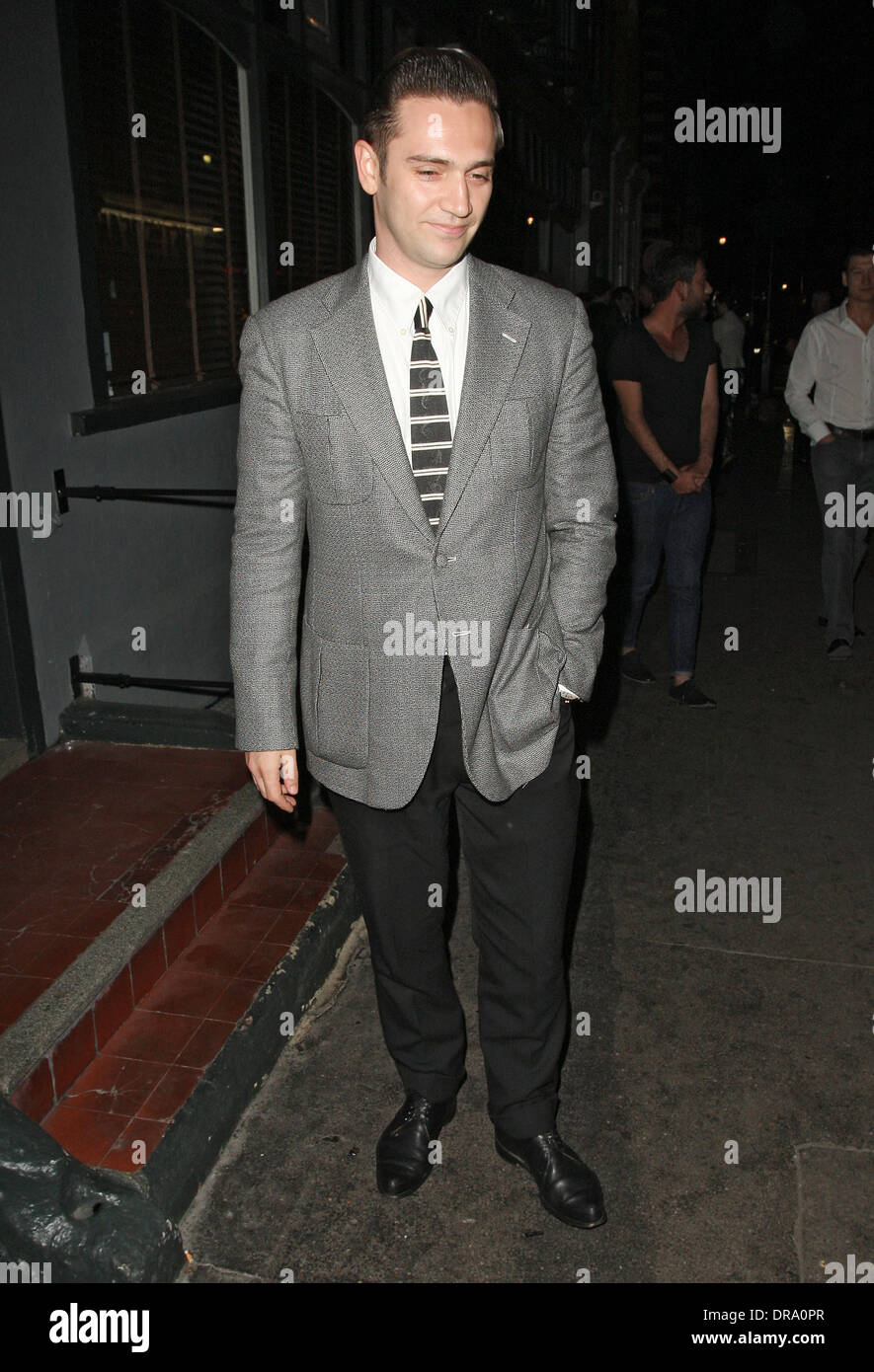 Reg Traviss leaves Groucho Club. The film director who dated tragic ...