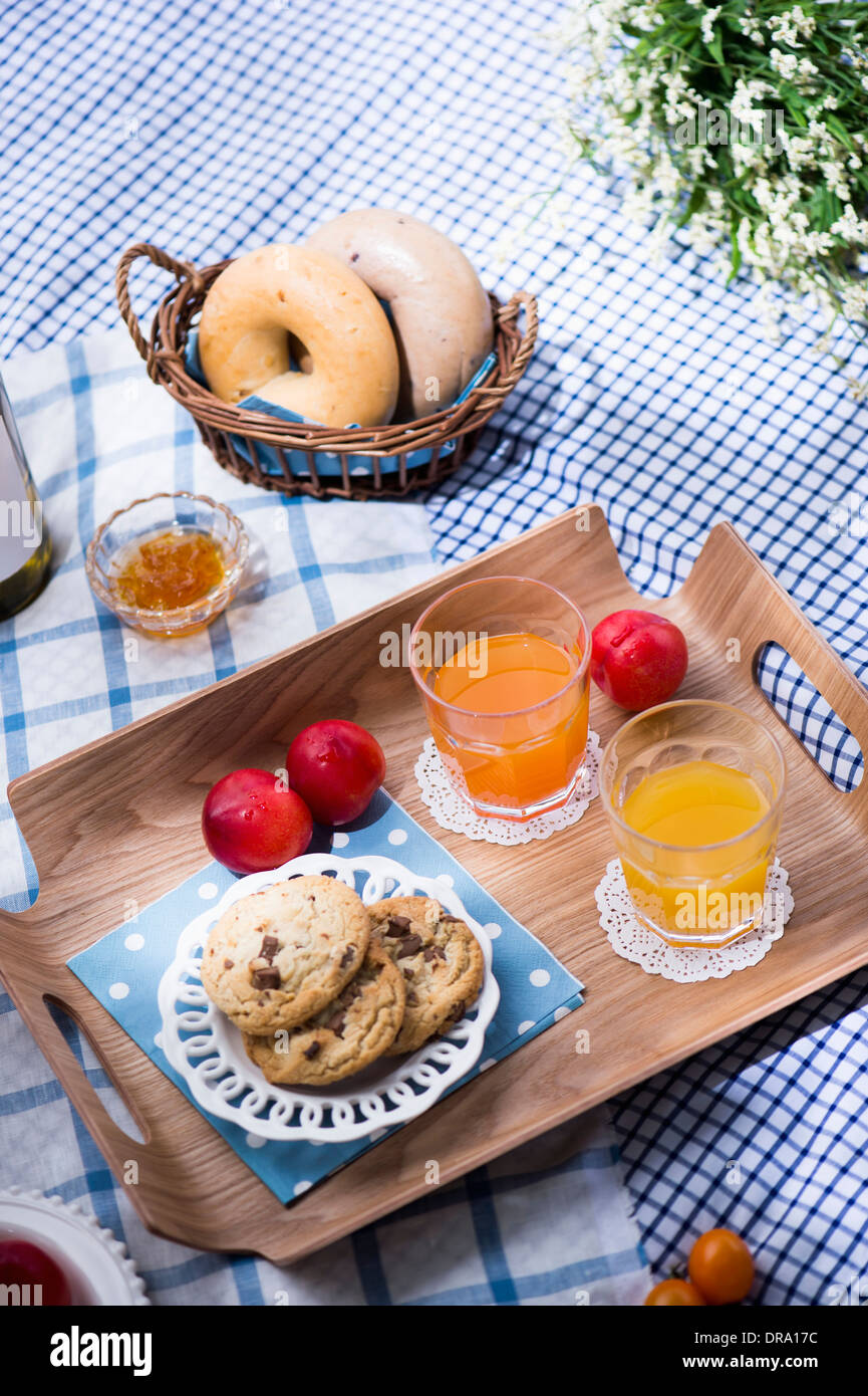 a picnic set spread out on a sheet Stock Photo - Alamy