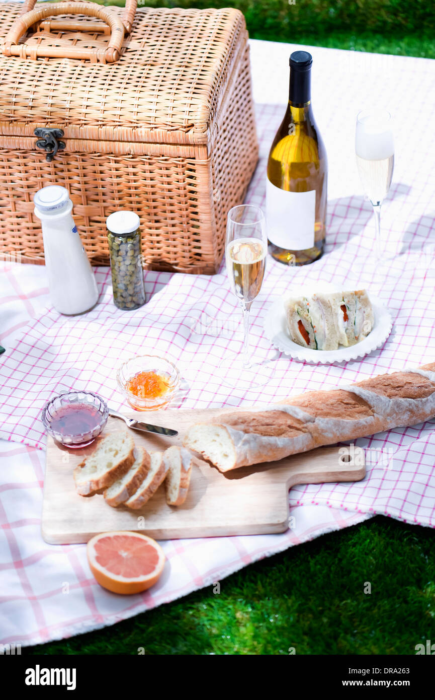 a picnic set spread out on a sheet Stock Photo - Alamy