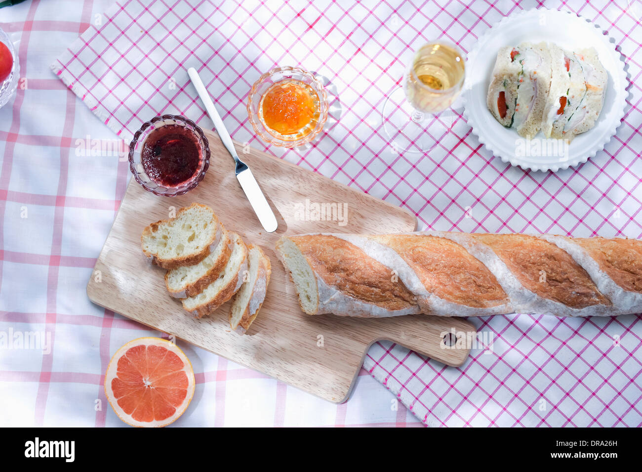 a picnic set spread out on a sheet Stock Photo - Alamy