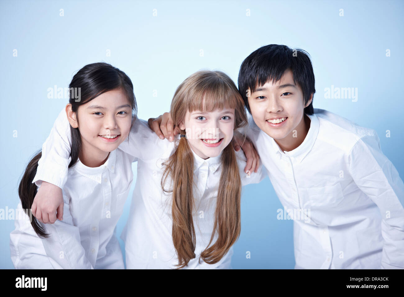 three kids hugging each other Stock Photo - Alamy