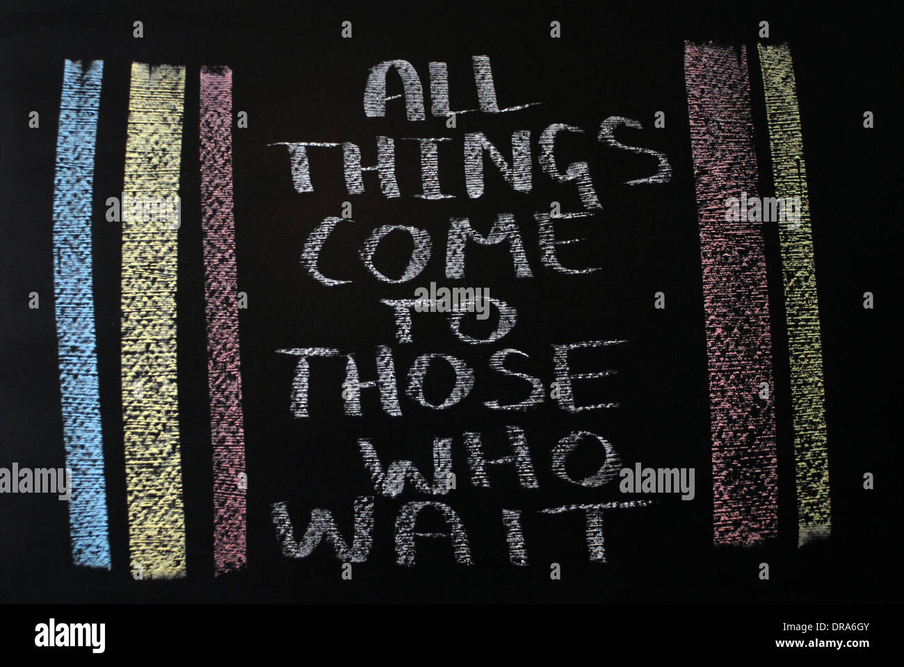 chalk writing - All things come to those that wait.- words written on ...