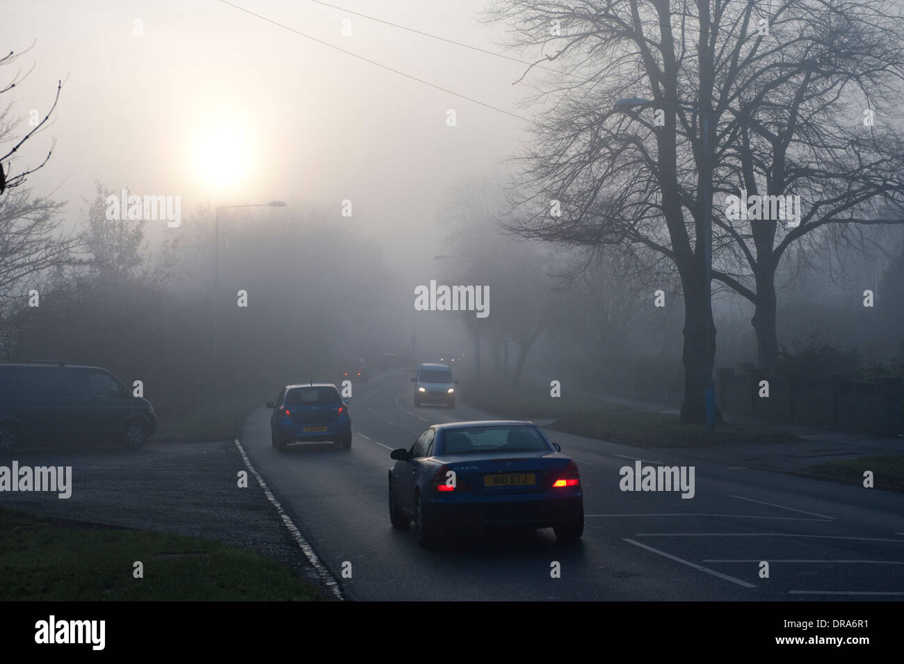 Road traffic during a foggy morning Stock Photo - Alamy