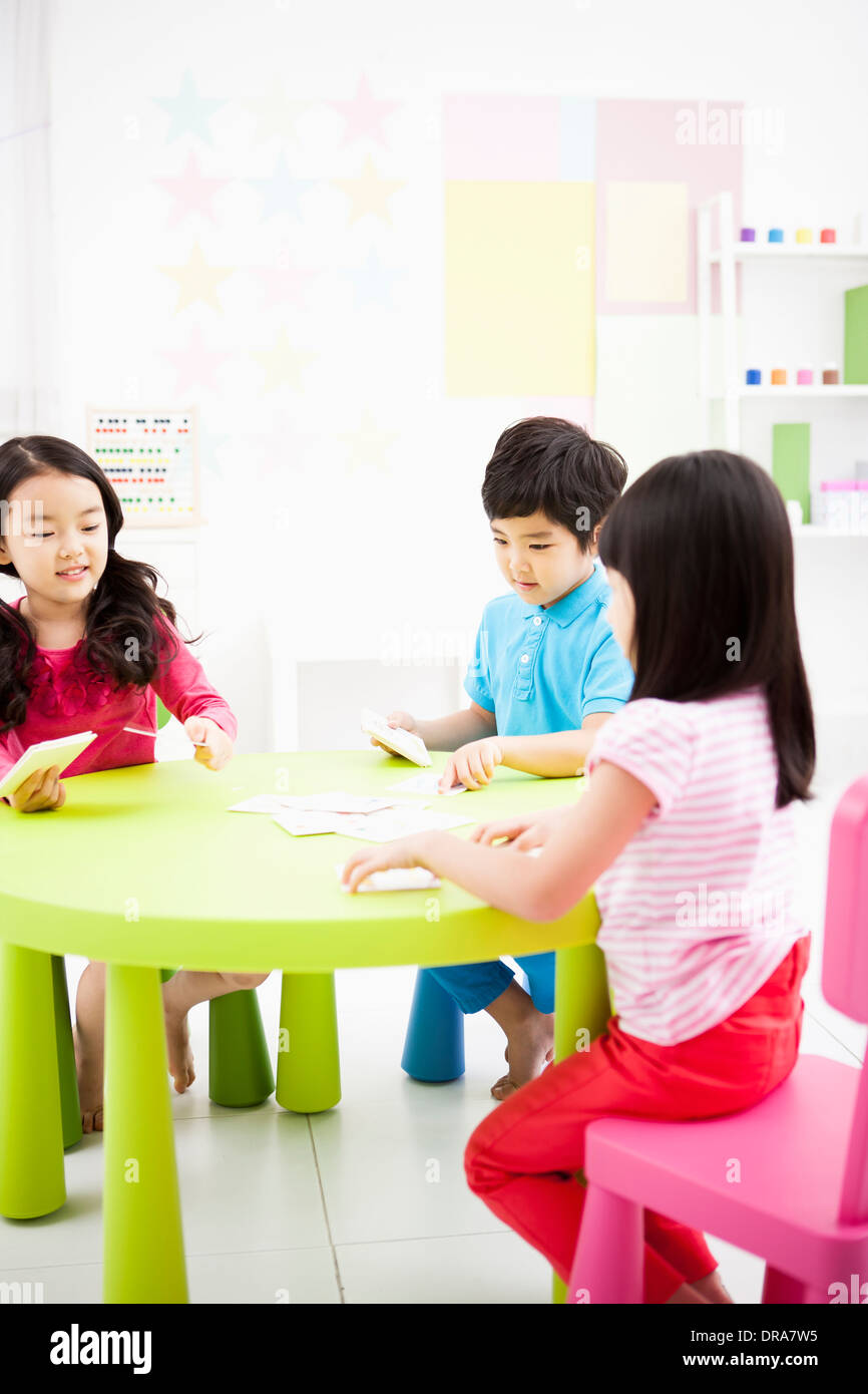 kids learning with toys at table Stock Photo - Alamy