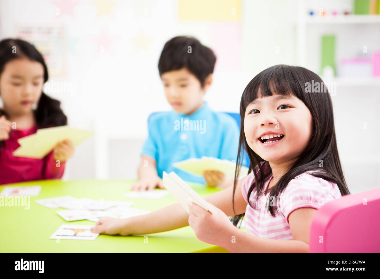 kids learning with toys at table Stock Photo - Alamy