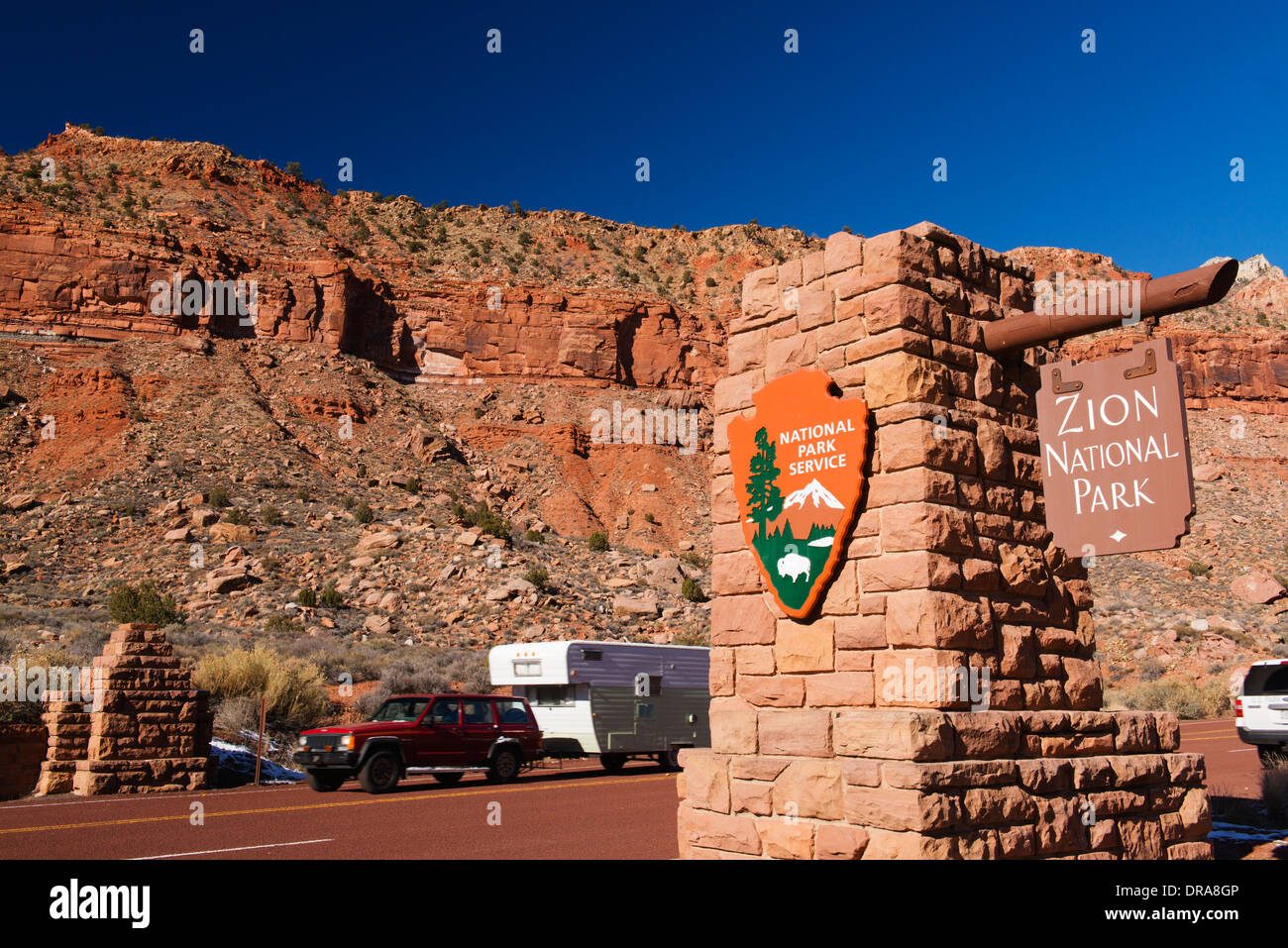 Entrance to Zion National Park with SUV and caravan Stock Photo - Alamy