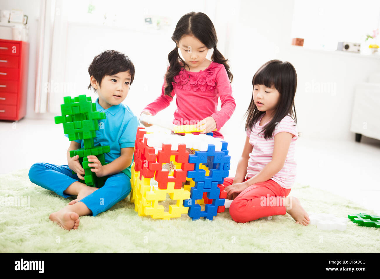 kids building toy blocks Stock Photo - Alamy