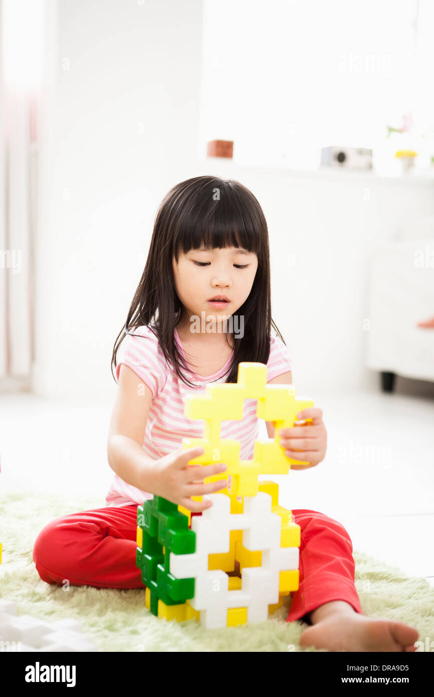 Girl with blocks on floor hi-res stock photography and images - Alamy