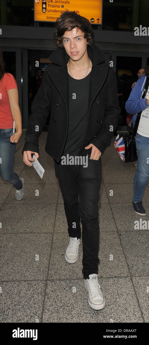 Harry Styles from boyband One Direction, arrives back home to England ...