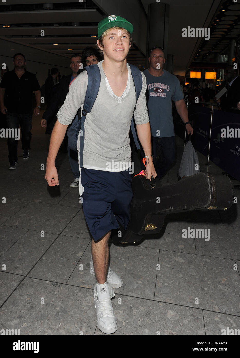 Niall Horan from boyband One Direction, arrives back home to England ...