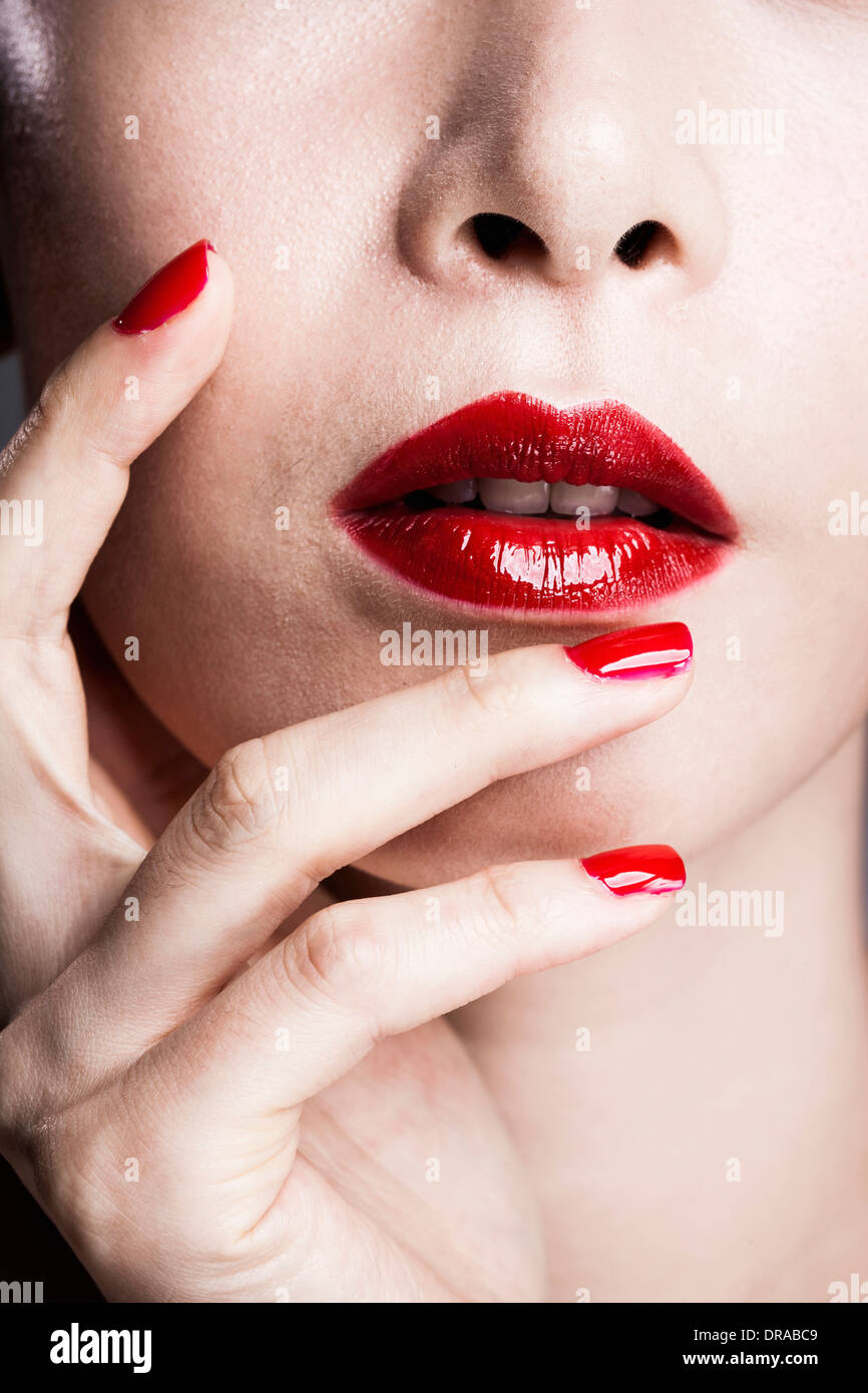 Female hand red lipstick hi-res stock photography and images - Alamy
