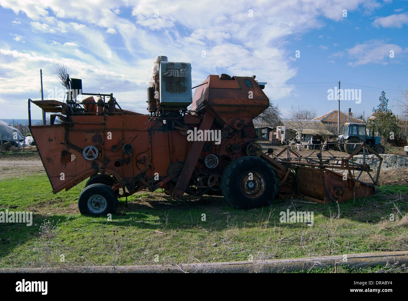 Old rusty farm machine Stock Photo - Alamy