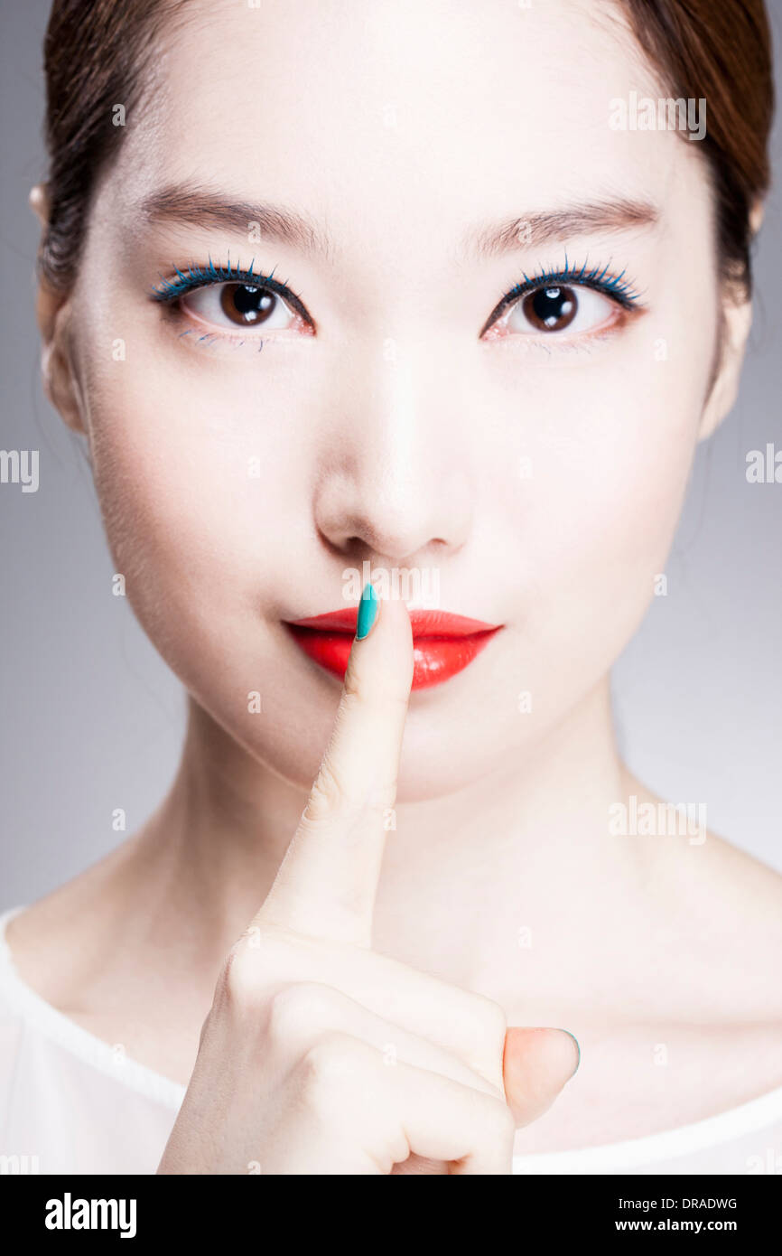 Index finger female red nail hi-res stock photography and images - Alamy
