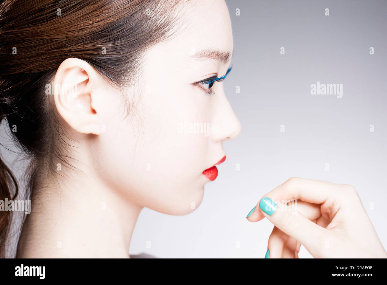 Woman ponytail headshot hi-res stock photography and images - Alamy