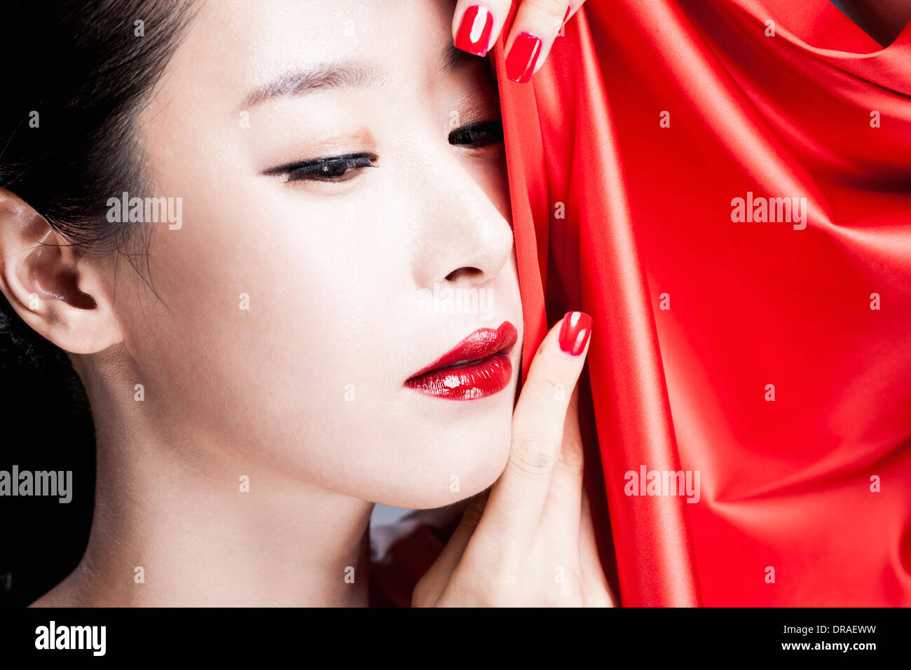 Woman shielding her face hi-res stock photography and images - Alamy